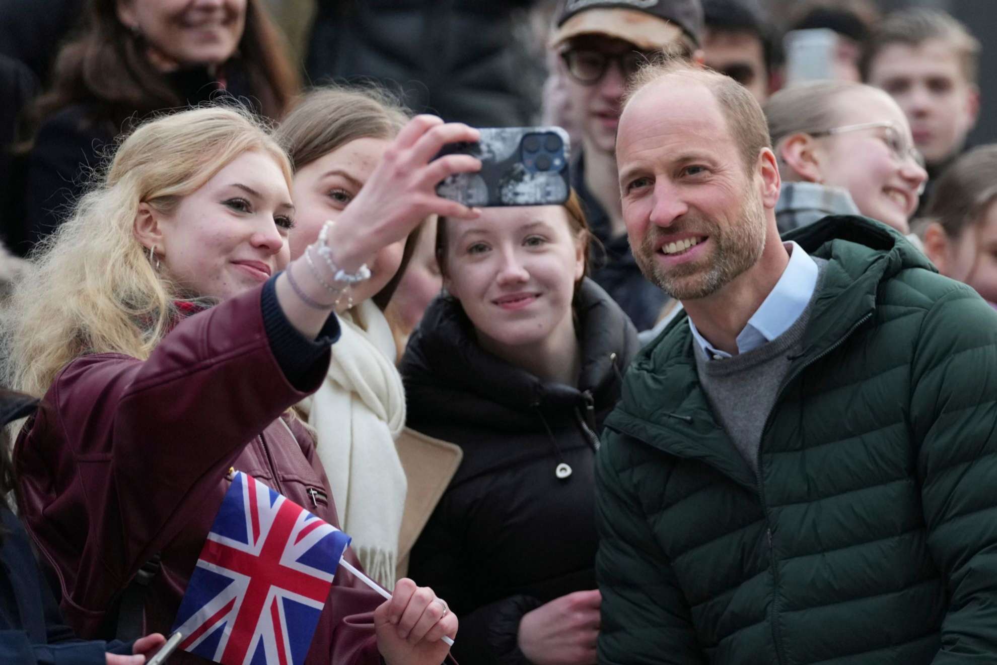 Prince William grabs a drink to toast with the Welsh Guards fully ...